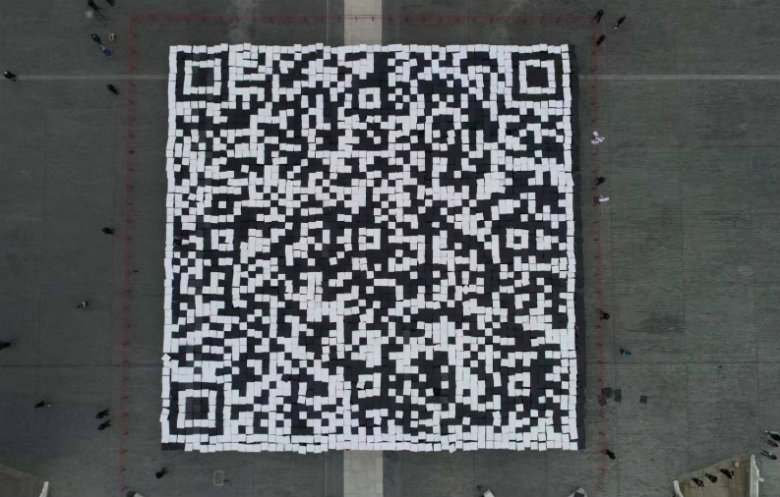 Largest human image of a QR code | Guinness World Records