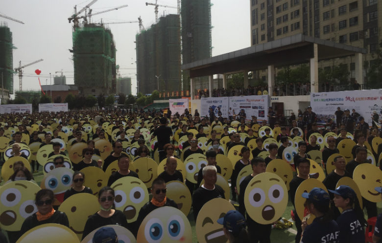 Largest gathering of people dressed as emoji faces | Guinness World Records