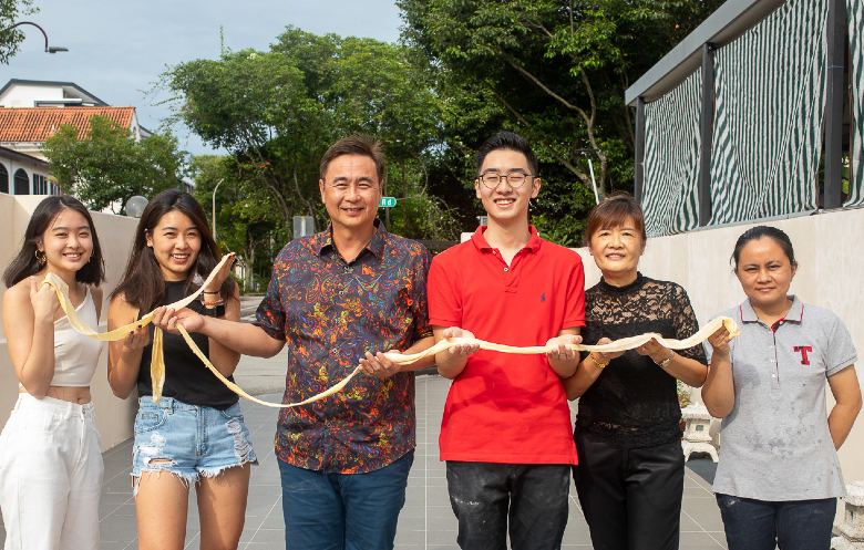 Longest sheet of pasta rolled in one minute by an individual | Guinness ...