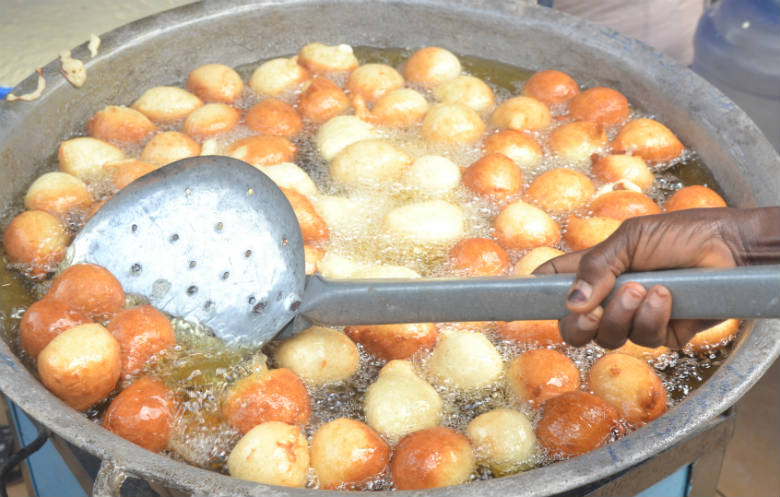 Most fried dough balls made in 8 hours by a team | Guinness World Records