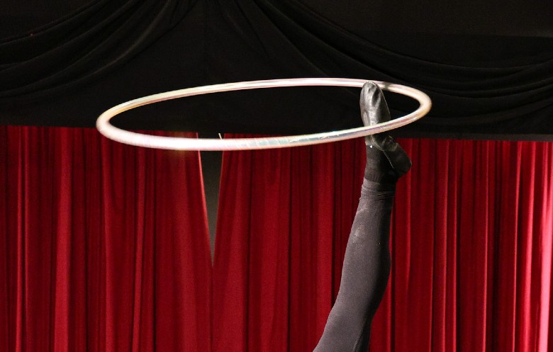 Most hula hoop rotations on the foot in the handstand position in 30 ...