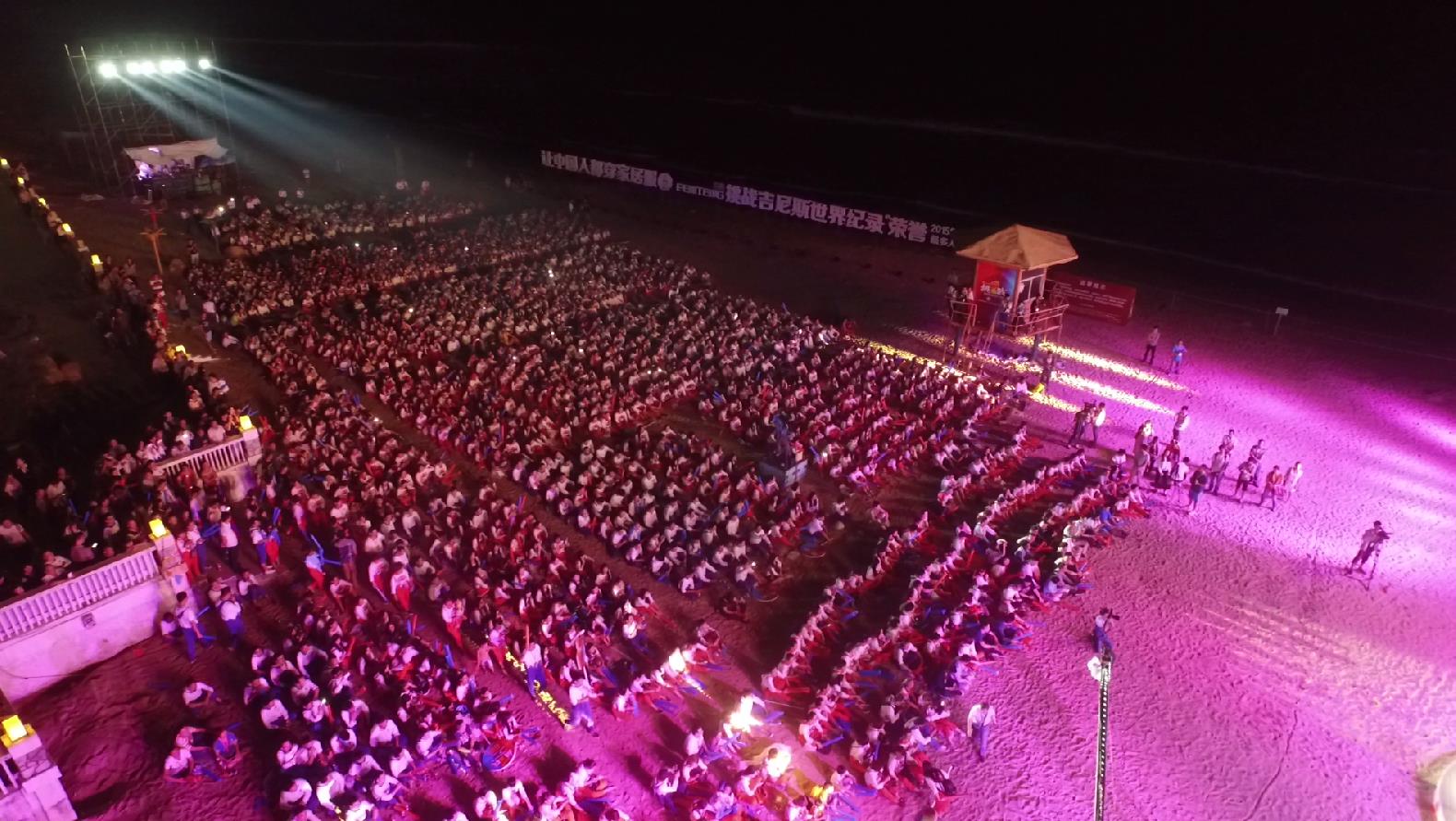 Largest gathering of people wearing one-piece pyjamas / pajamas (single ...