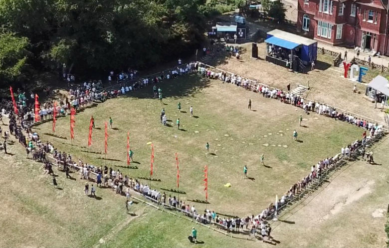Most arm-linked people to stand up simultaneously | Guinness World Records